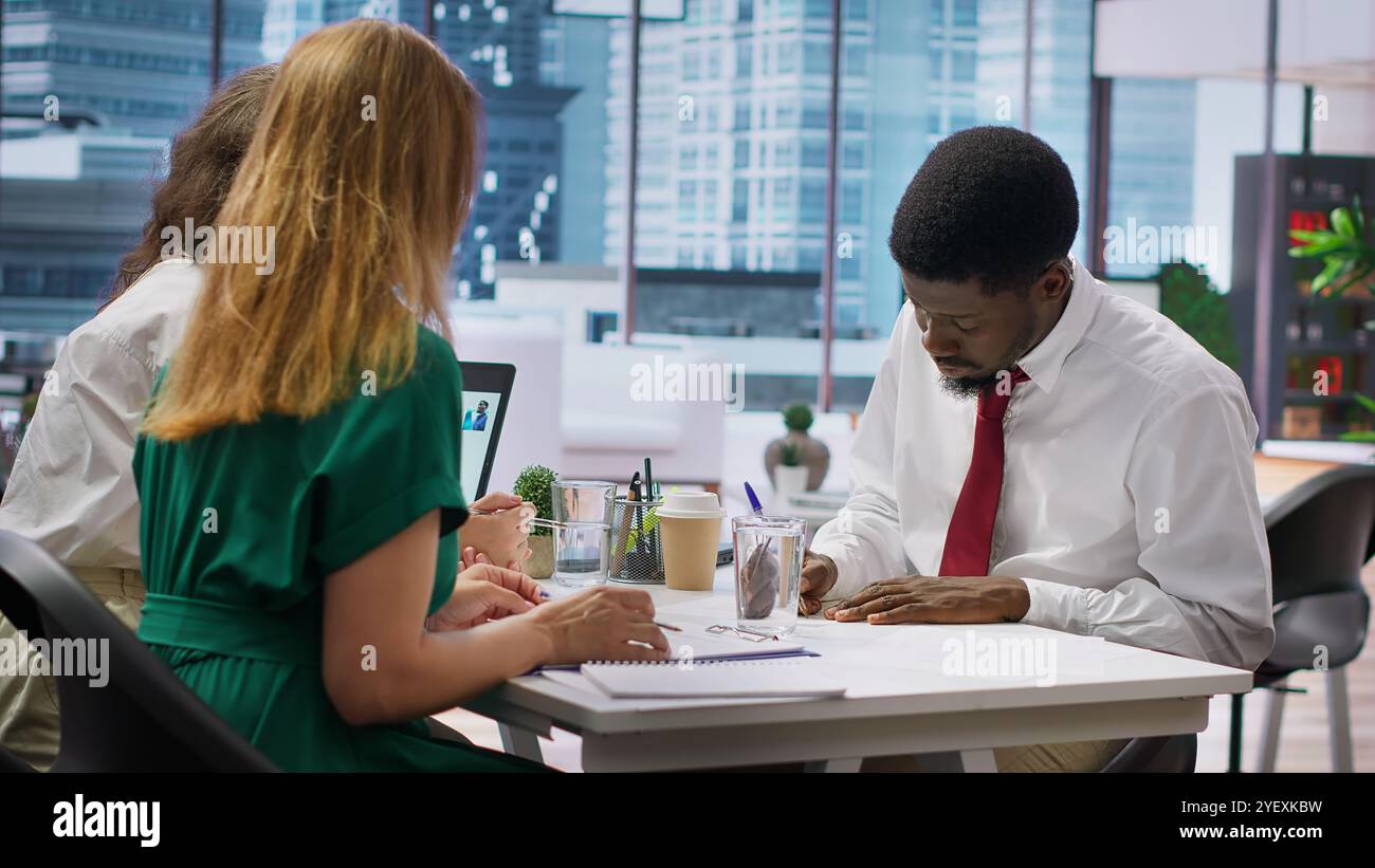 Job Seeker At Interview Writing His Name On Application Form Registering In The Company