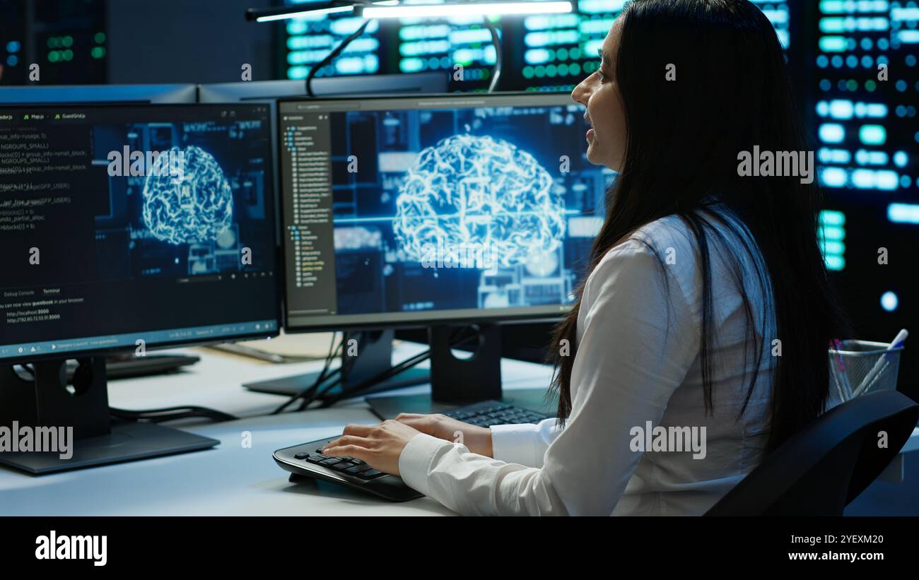 Team of engineers doing checkup on server hub to optimize it for data processing requirements of ...