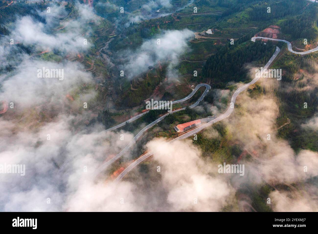 CONGJIANG, CHINA - NOVEMBER 1, 2024 - Aerial photo shows a winding ...