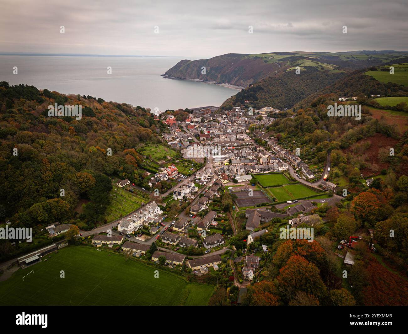 Stunning autumnal colors covering the trees surrounding the coastal ...