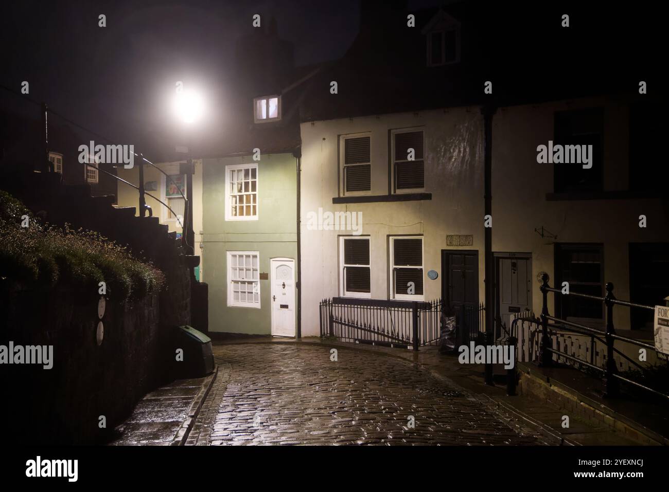 Night scene at the bottom of Abbey Steps, Whitby, Yorkshire Stock Photo ...