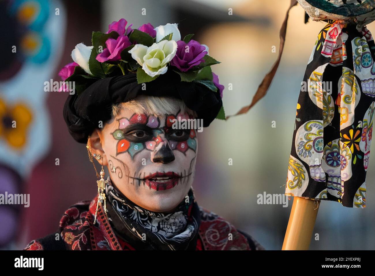 Marnee Ostoa Garciam 29, walks in a Day of the Dead procession, Friday ...