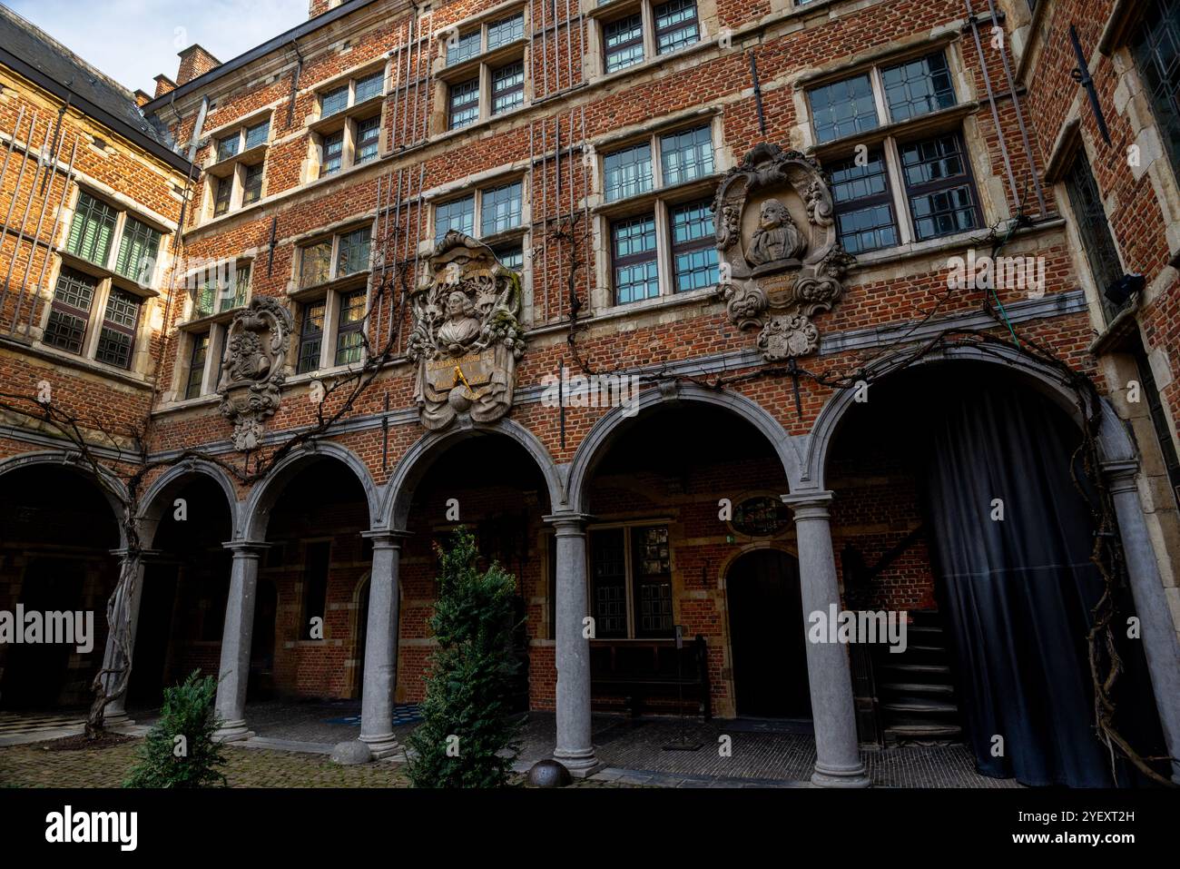 Cartouche facade and side stairway in the Flemish Renaissance style ...