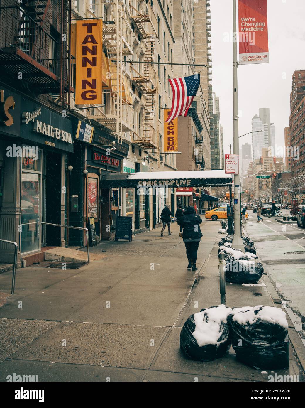 A snowy street scene on the Upper East Side in Manhattan, New York ...