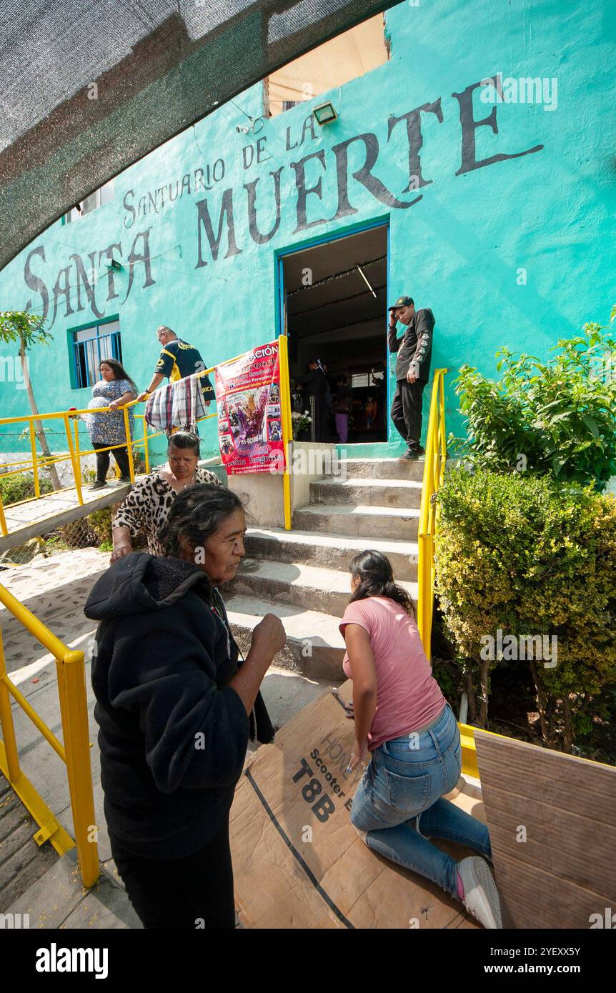 Faithfuls attending the temple of Santa Muerte in the municipality of ...