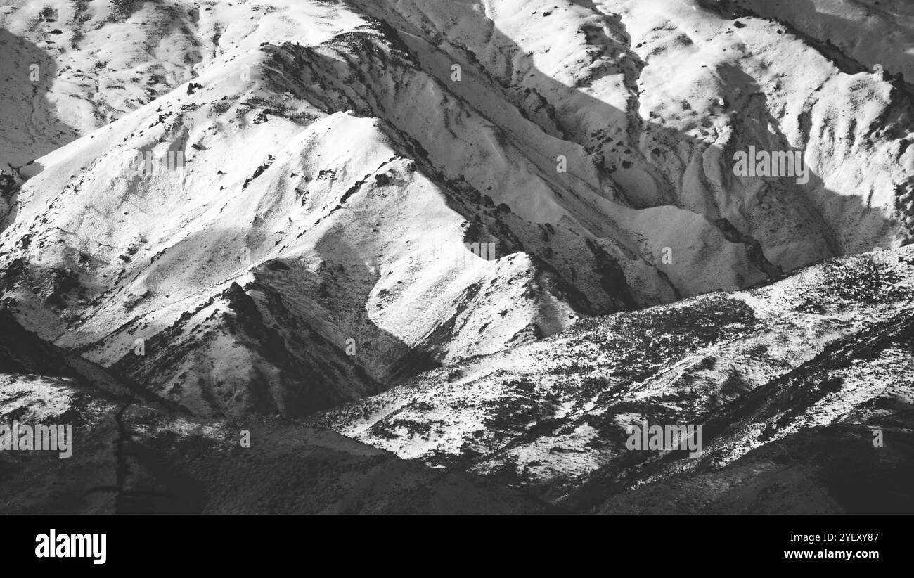 Snow covered mountains close up in Alexandra new Zealand iconic scenery ...