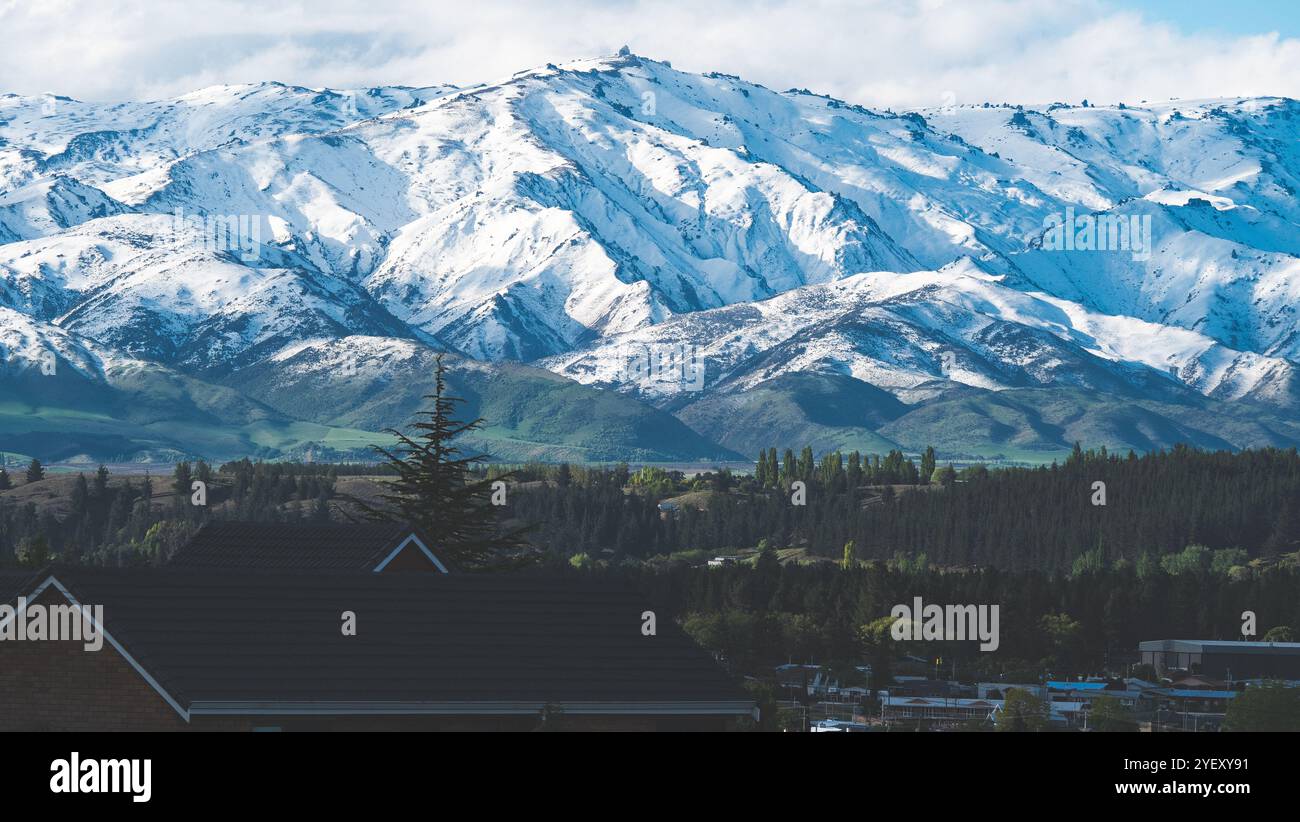 Snow covered mountains close up in Alexandra new Zealand iconic scenery ...