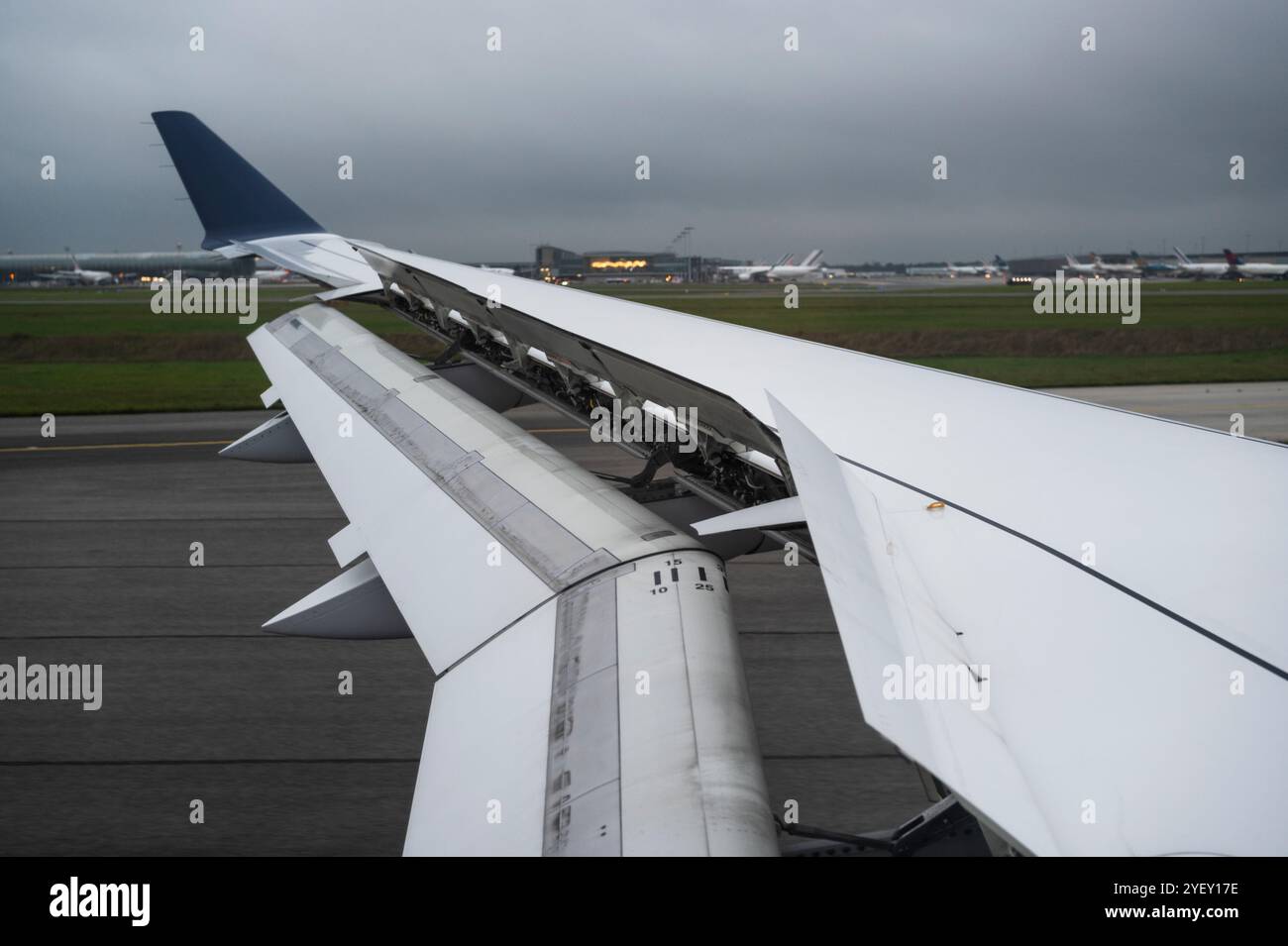 Airplane Wing with Deployed Flaps During Landing Stock Photo - Alamy
