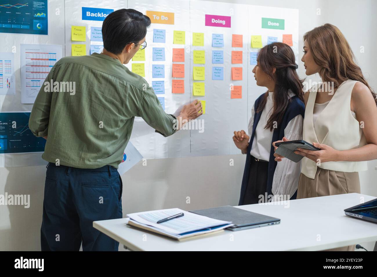 Brainstorming Session Using Sticky Notes On A Task Board Kanban To Organize Ideas And