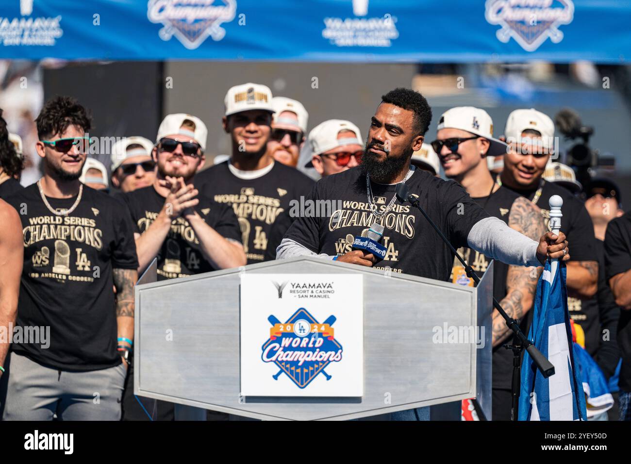 Los Angeles Dodgers outfielder Teoscar Hernandez tears up during the ...