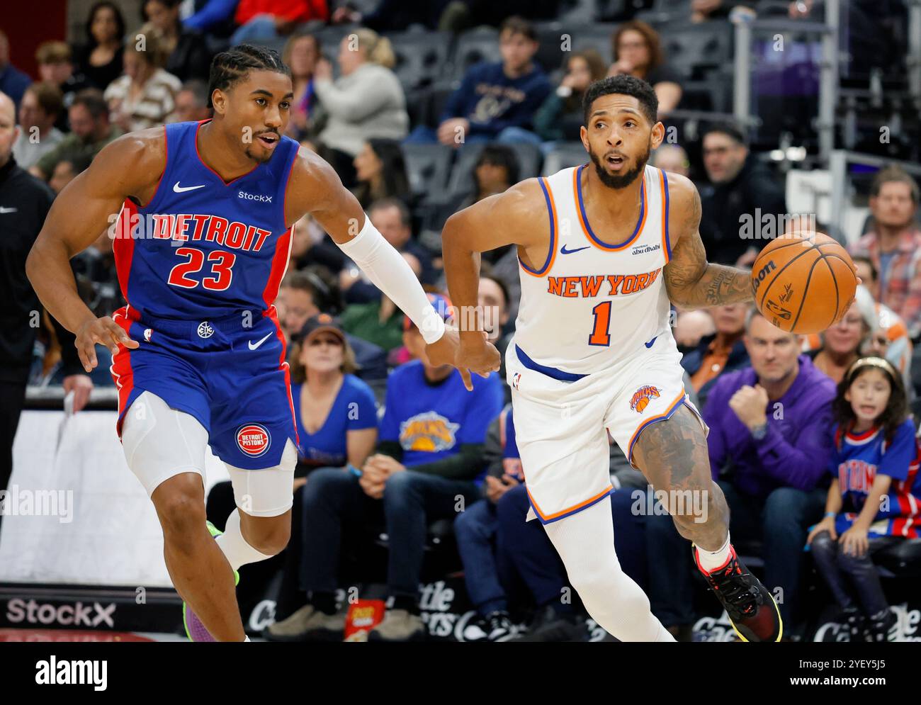 New York Knicks guard Cameron Payne (1) drives past Detroit Pistons ...