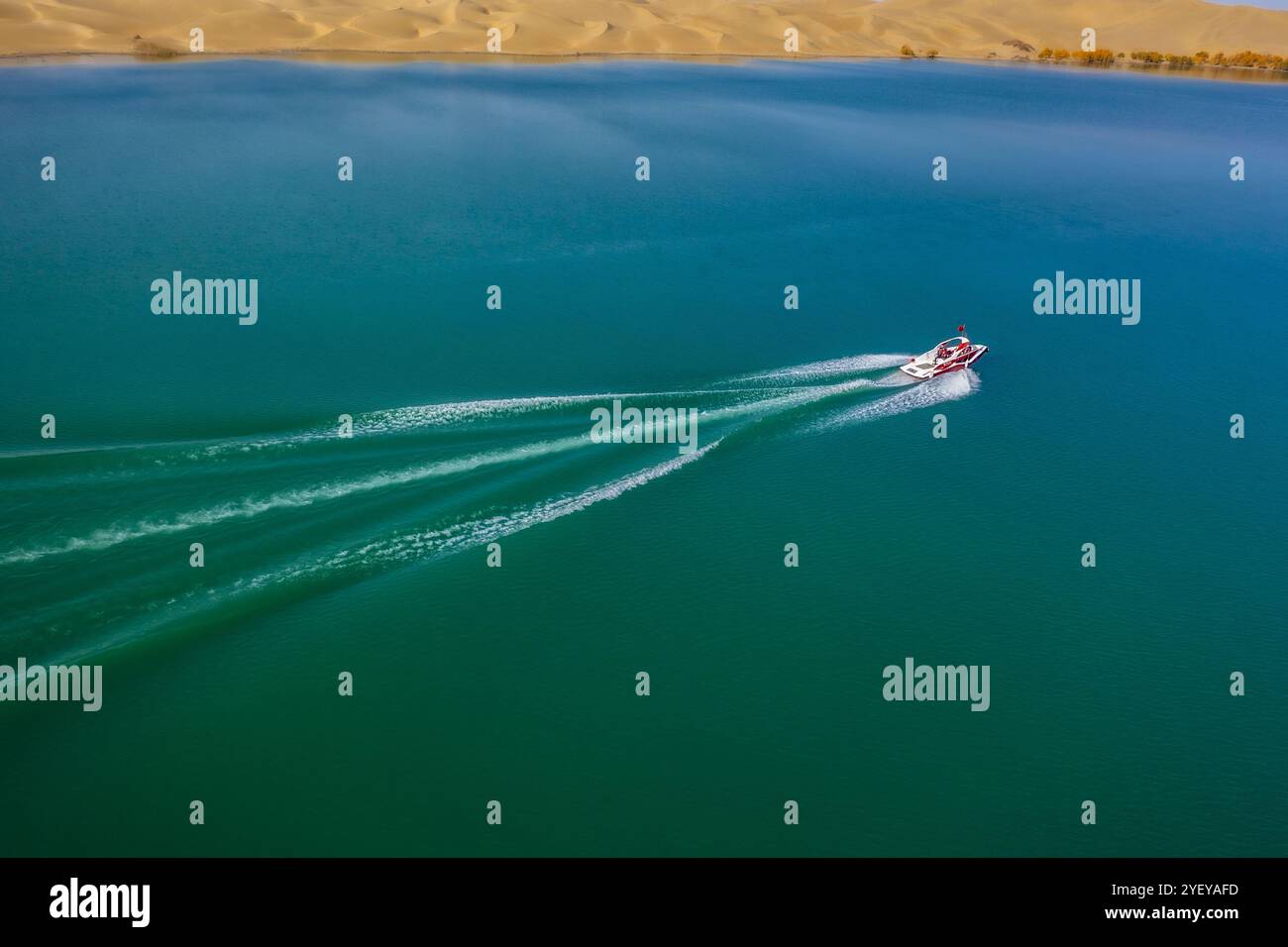 BAZHOU, CHINA - OCTOBER 26, 2024 - Tourists take a speedboat to see ...