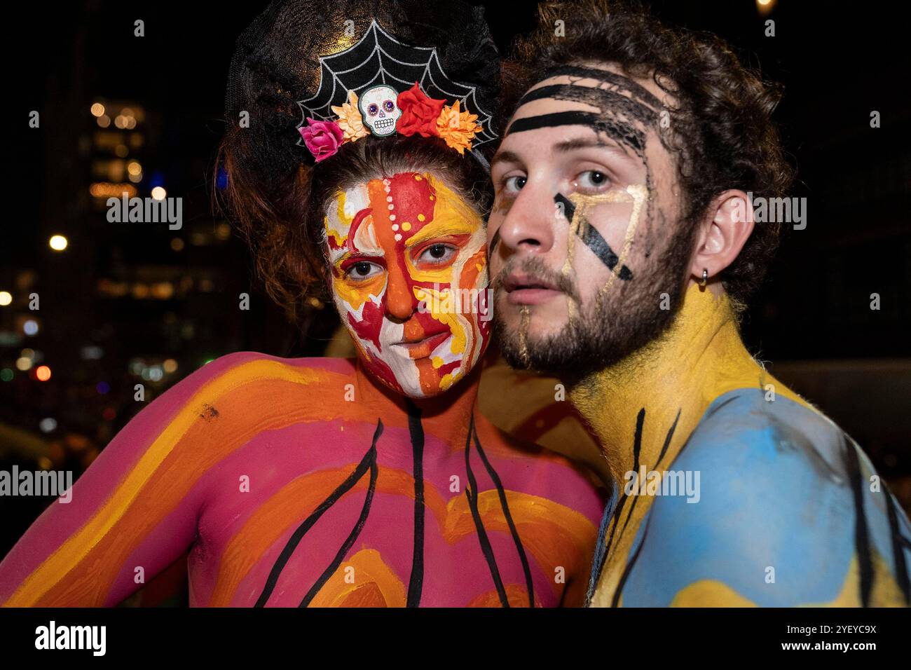 New York, New York, USA. 31st Oct, 2024. Parade participents painted by ...