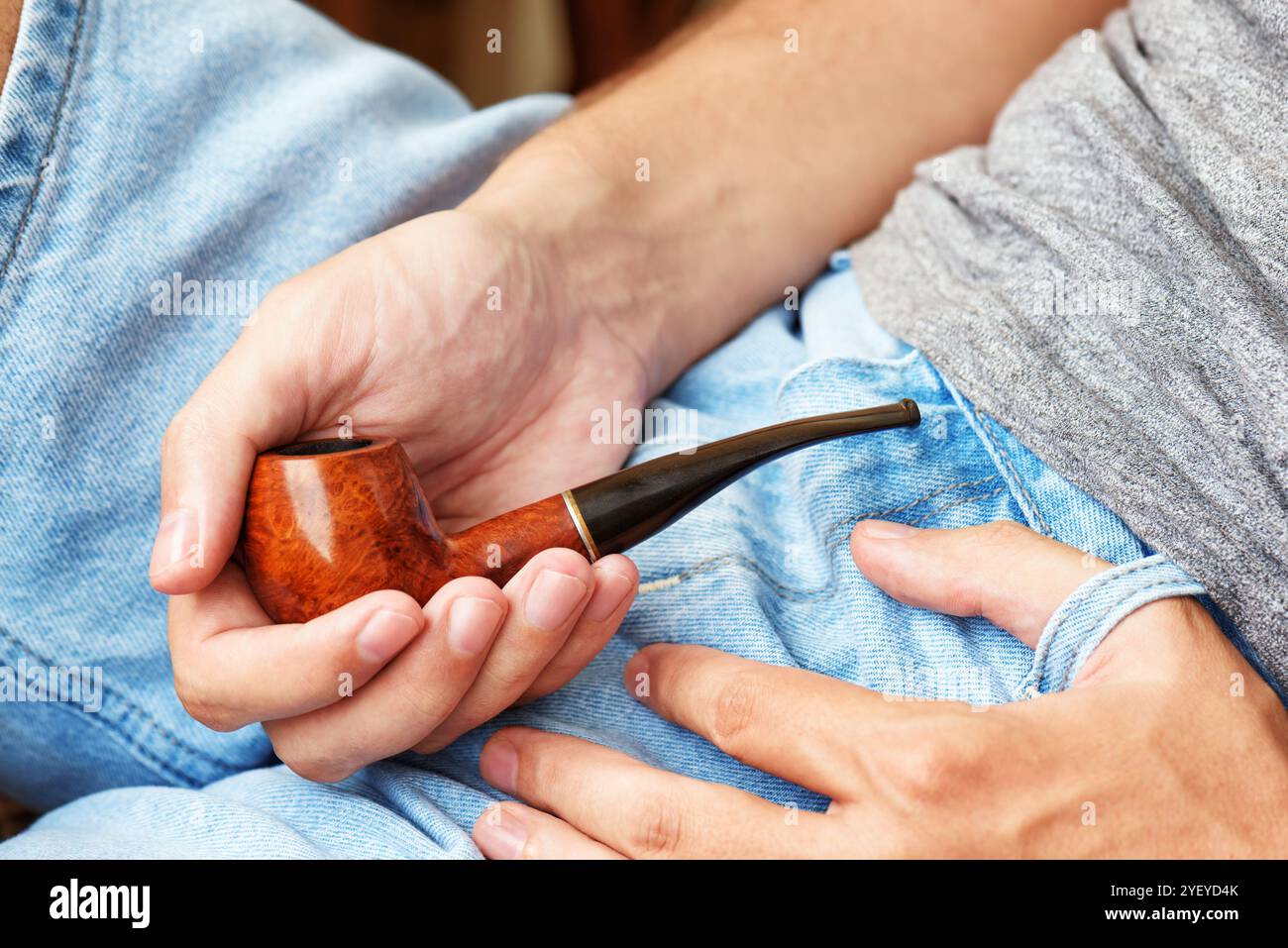 Hand holding pipe hi-res stock photography and images - Alamy