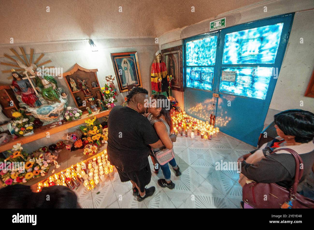 Devotees Gives Tribute Of Santa Muerte Faithfuls attending the temple ...