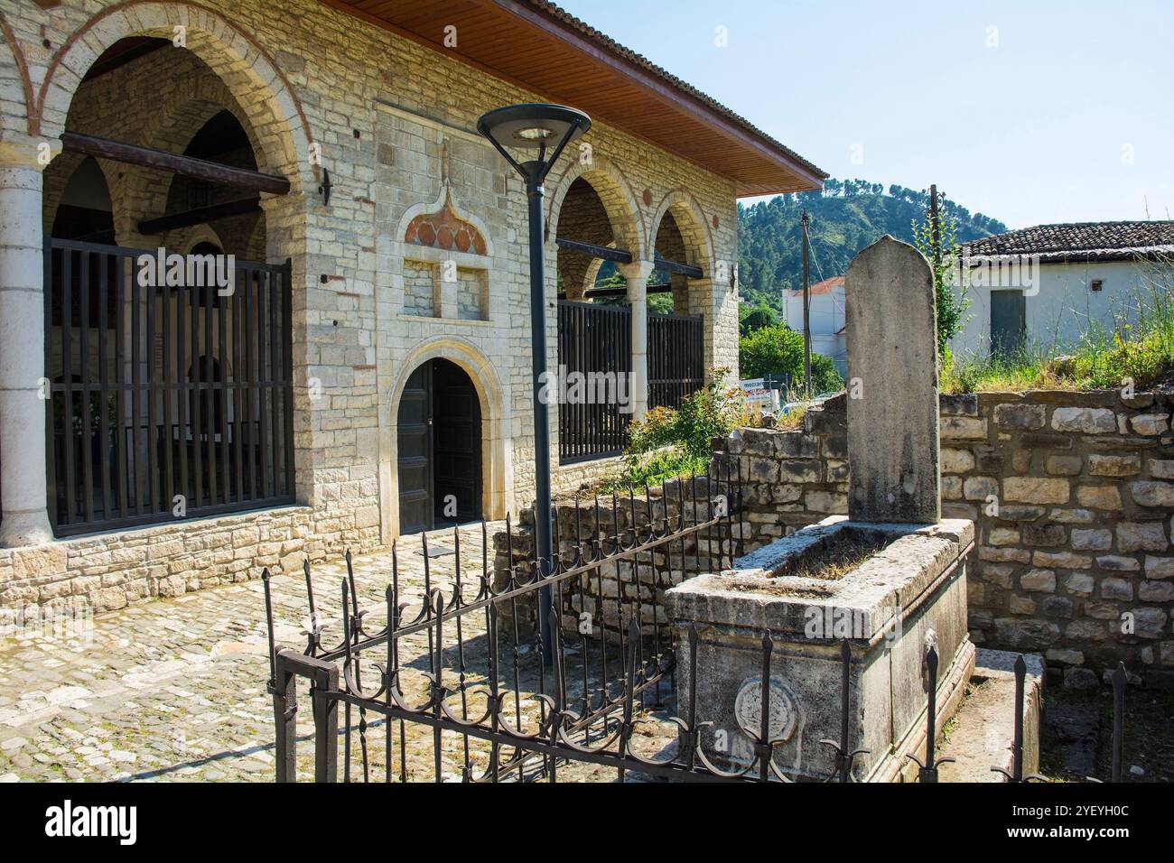 An historic grave outside the entrance to the King Mosque in Berat ...