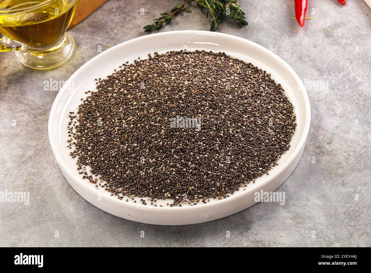 Vegan cuisine -raw Chia seeds for cooking Stock Photo - Alamy