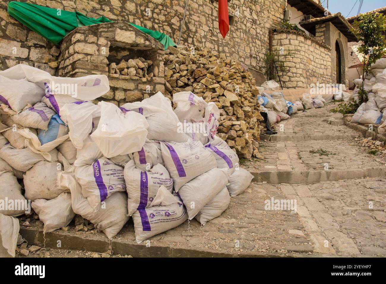 Berat, Albania - June 1st 2024. Bags of building materials for the ...