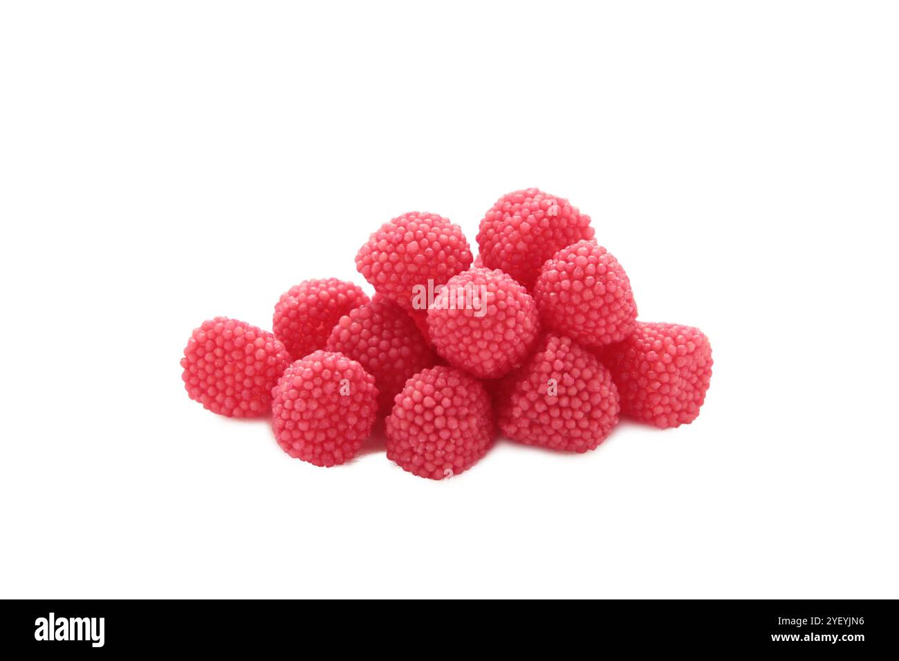 Red chewing sweets in the form of berries isolated on white background ...