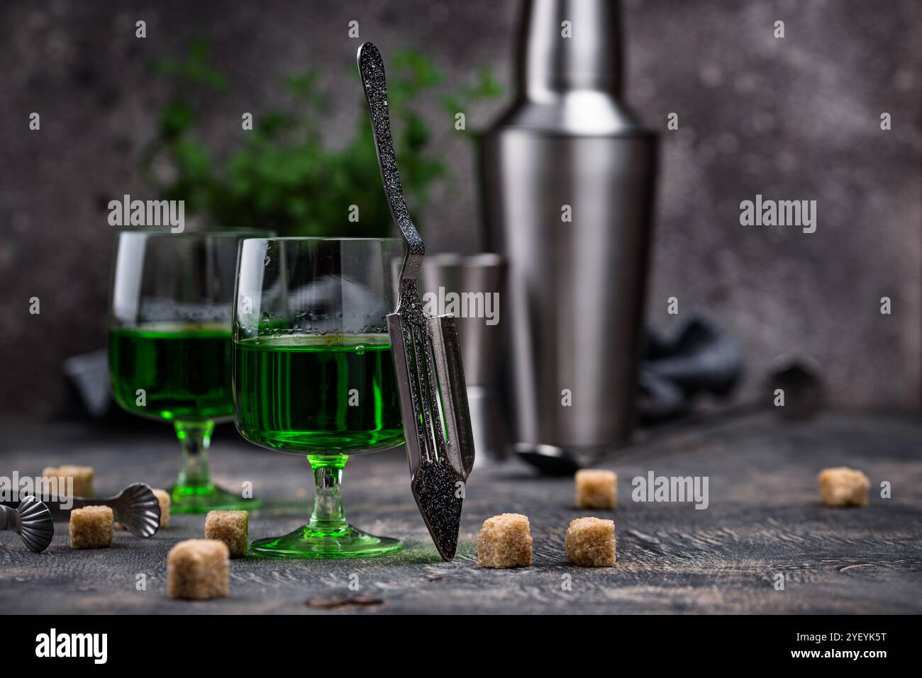 Glass of absinthe with cane sugar Stock Photo - Alamy