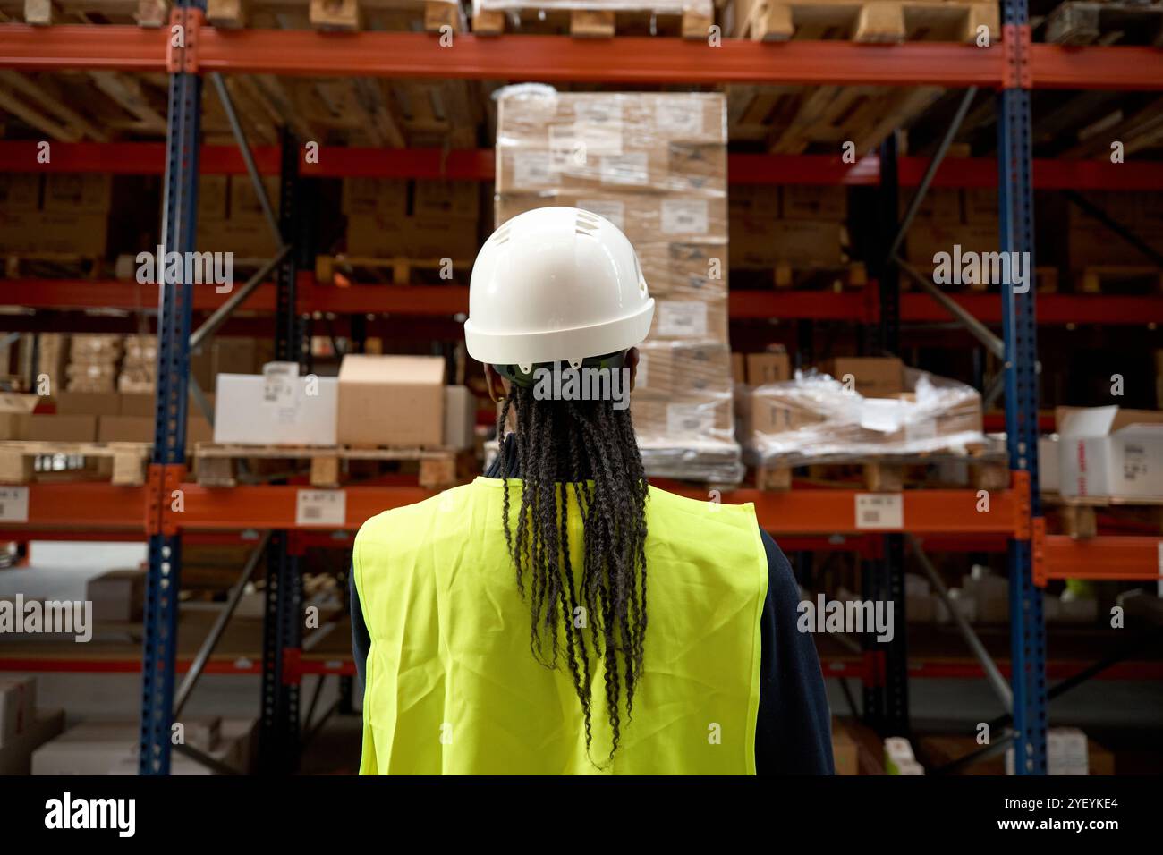 Woman inspecting inventory in warehouse hi-res stock photography and ...
