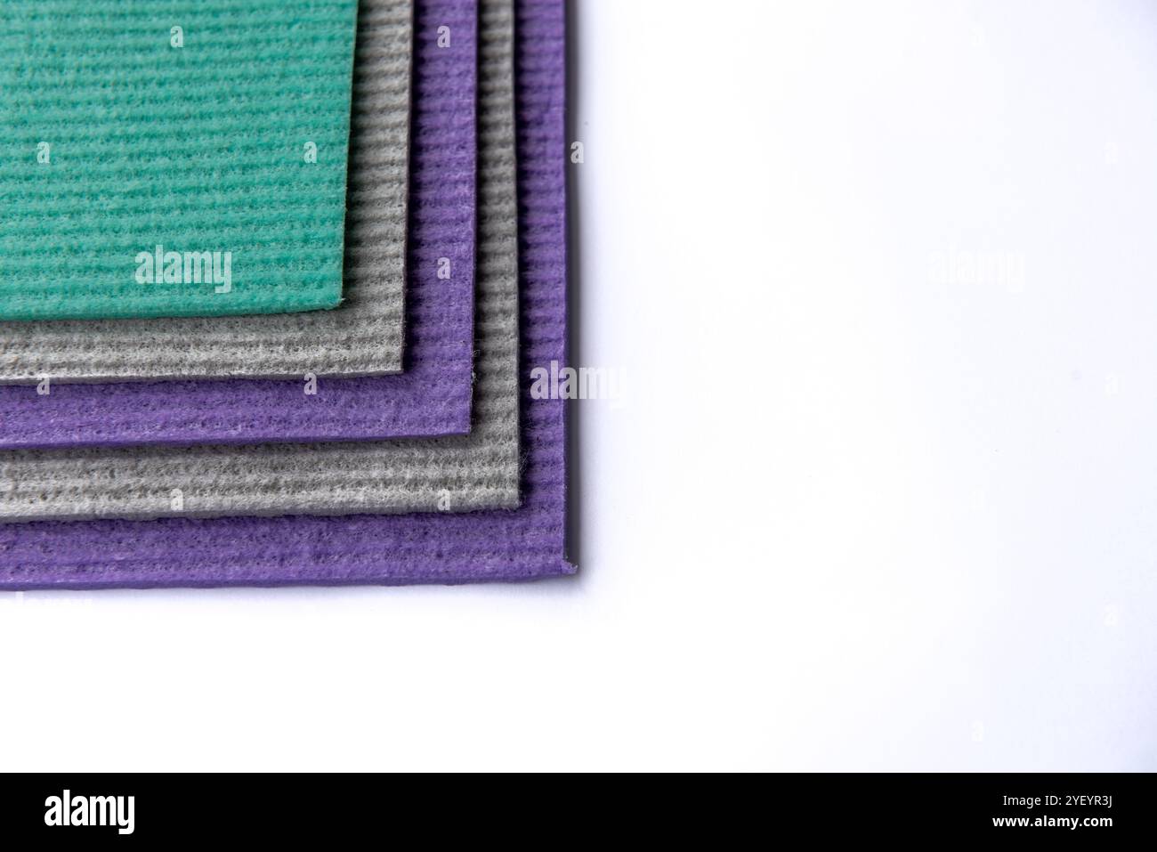 Colourful sponges with visible pores for scrubbing and cleaning. Home ...