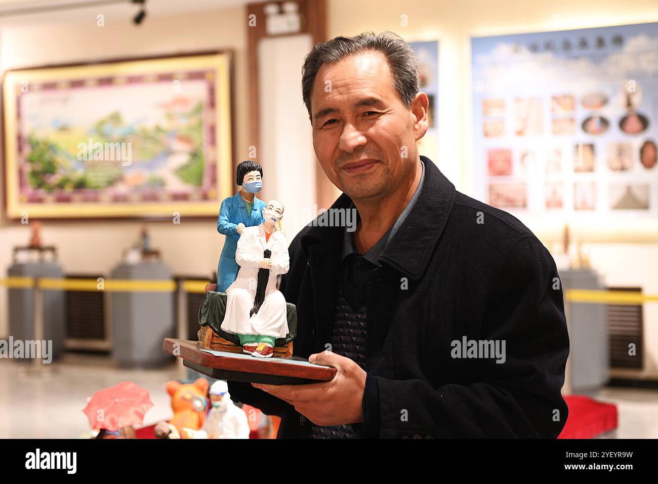 (241102) -- LONGDE, Nov. 2, 2024 (Xinhua) -- Yang Jianian shows a ...