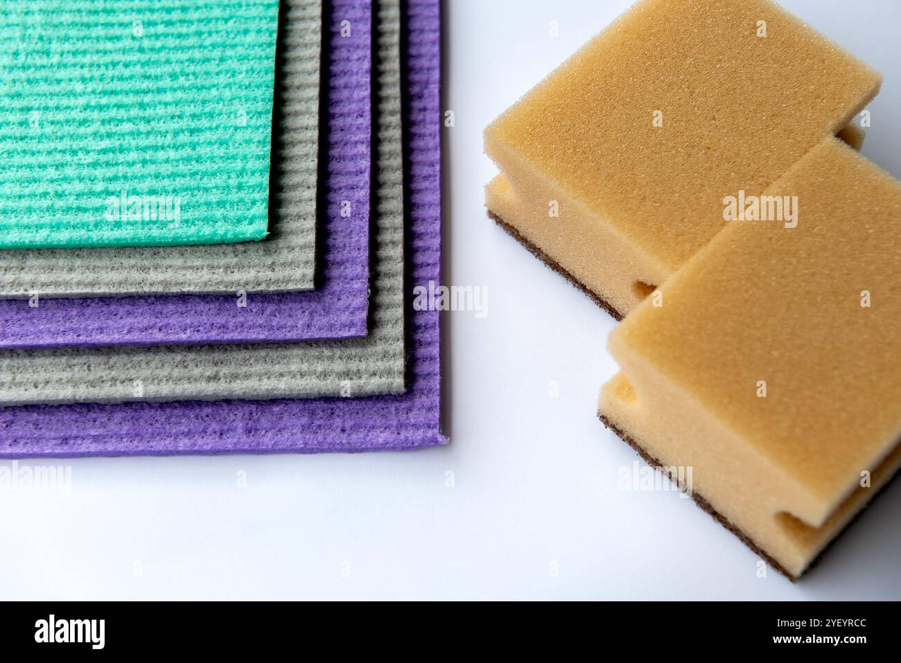 Colourful sponges with visible pores for scrubbing and cleaning. Home ...