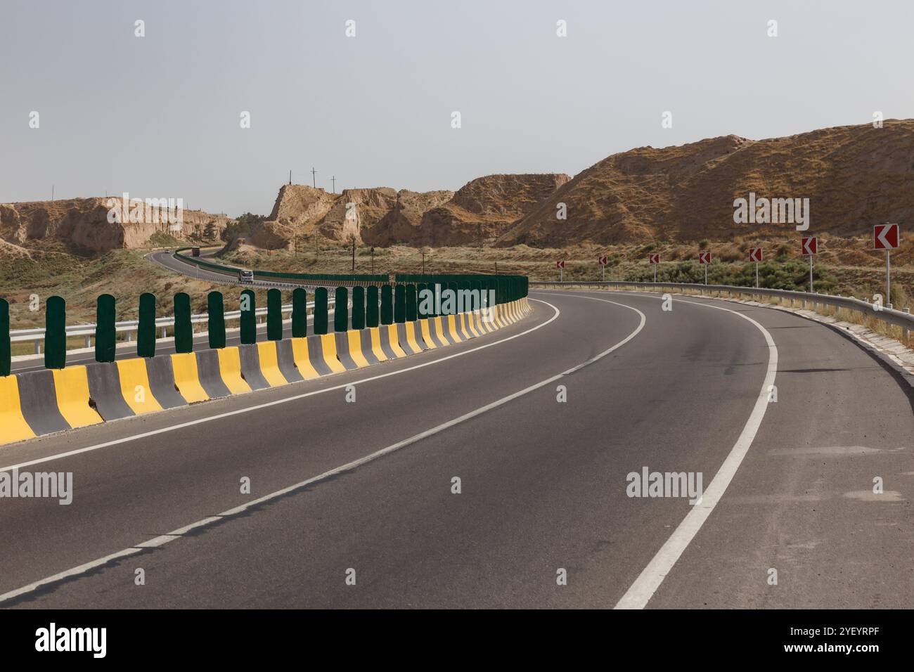 Asphalt road in Tajikistan. Khatlon Region. Central Asia. Road signs ...