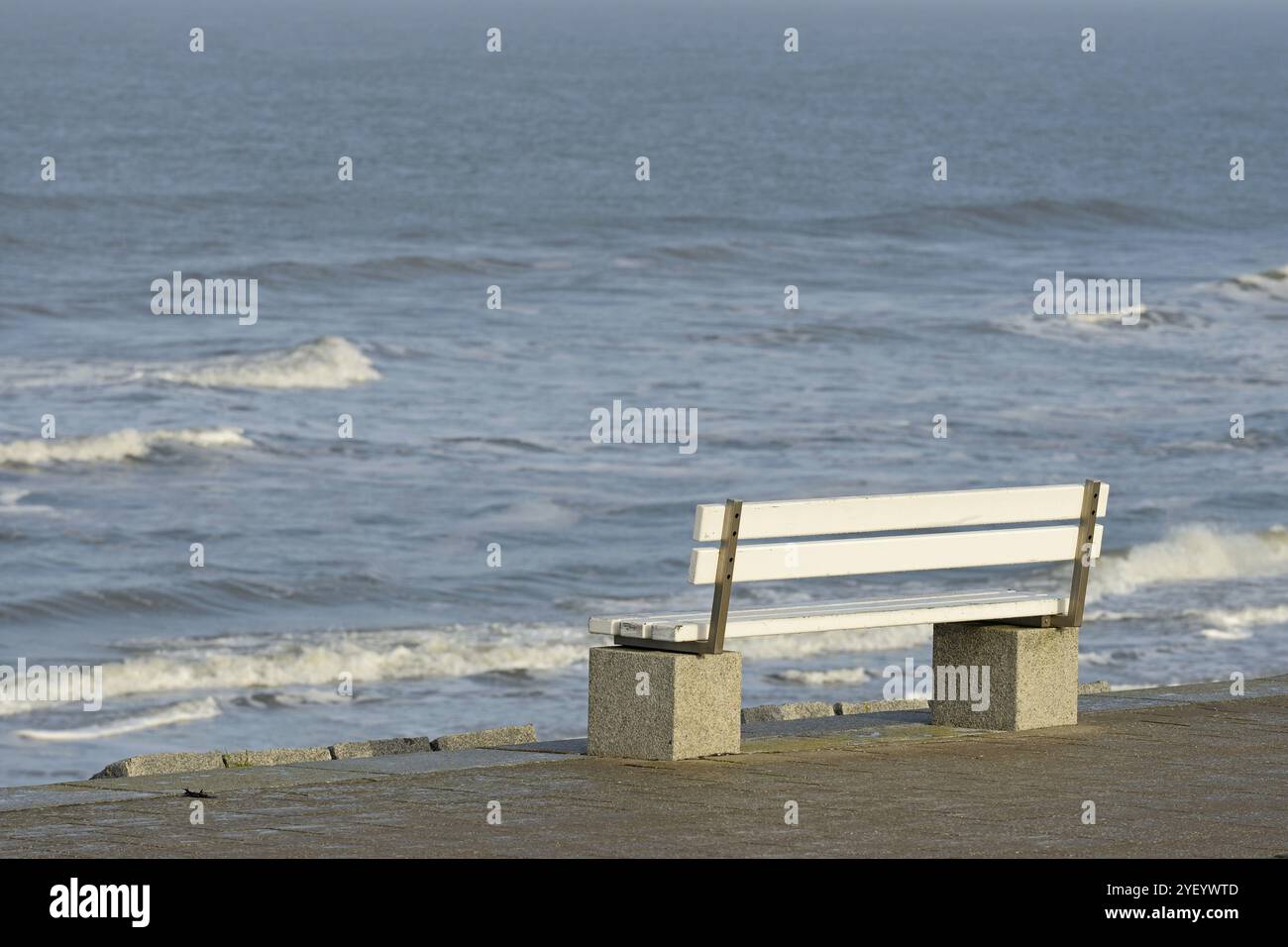 Bench on the beach promenade with a view of the North Sea, Norderney ...