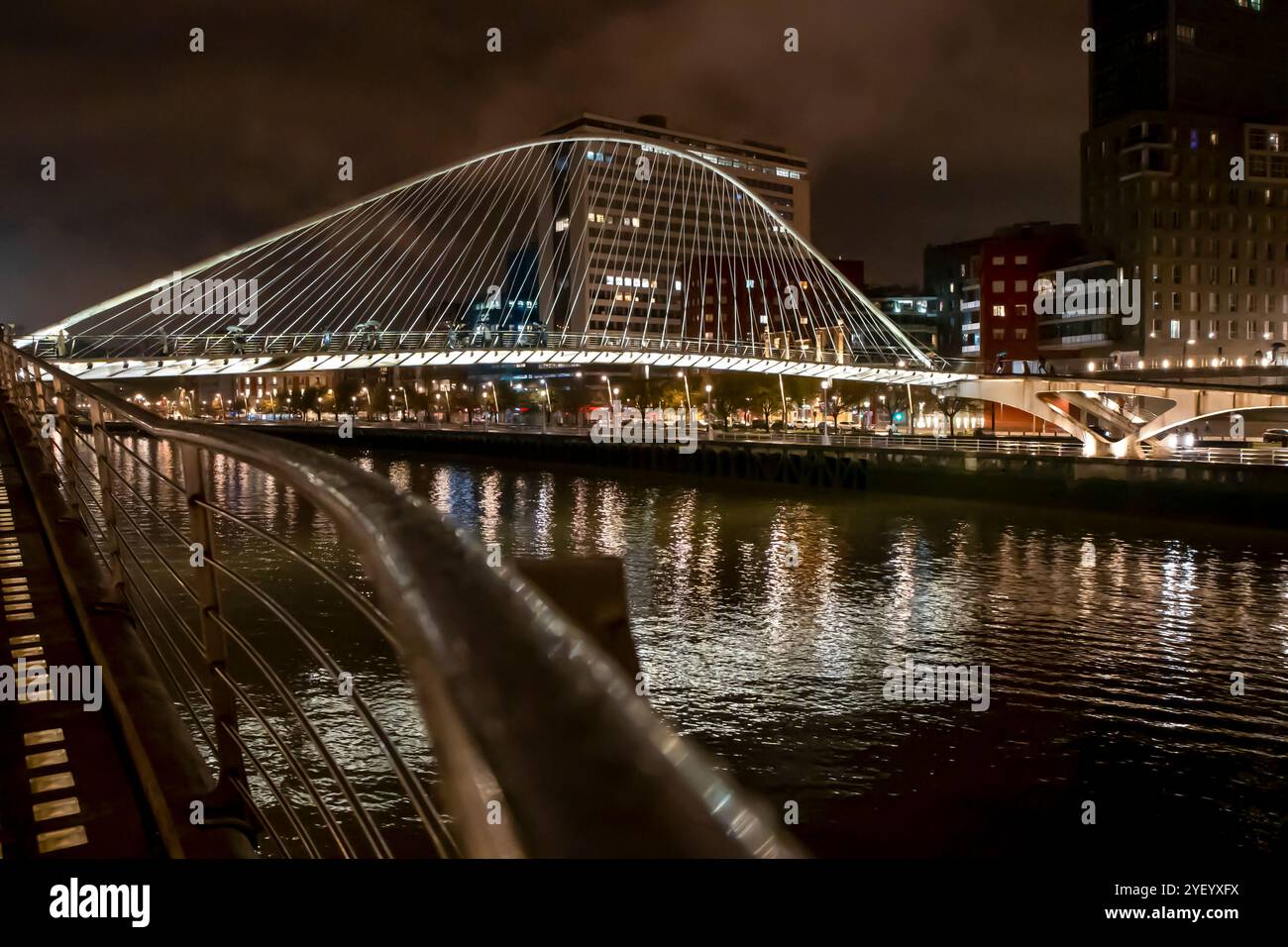 WHITE ARCHED BRIDGE OVER THE RIVER Stock Photo - Alamy