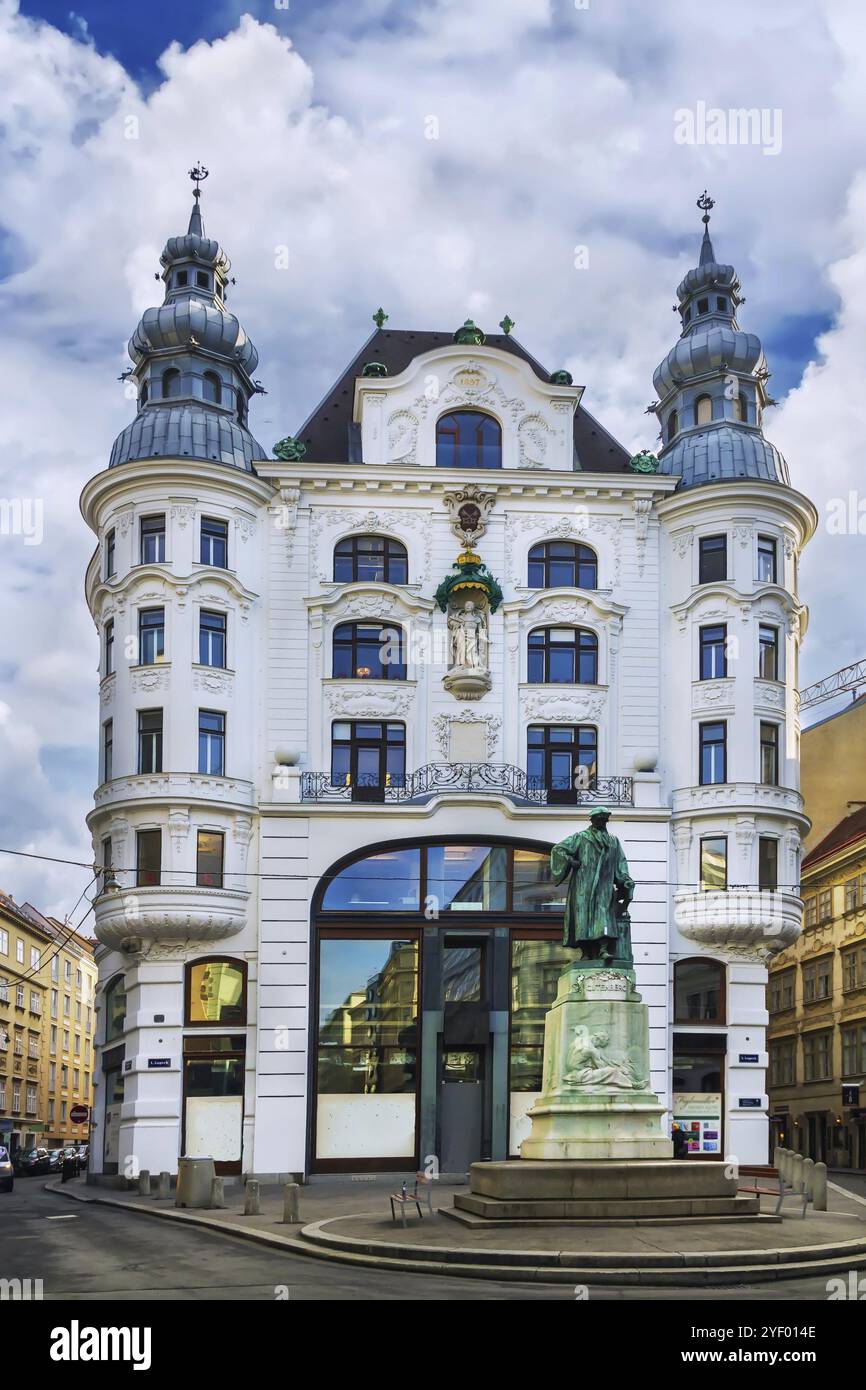 Building of ancient department store with monument to Gutenberg in ...