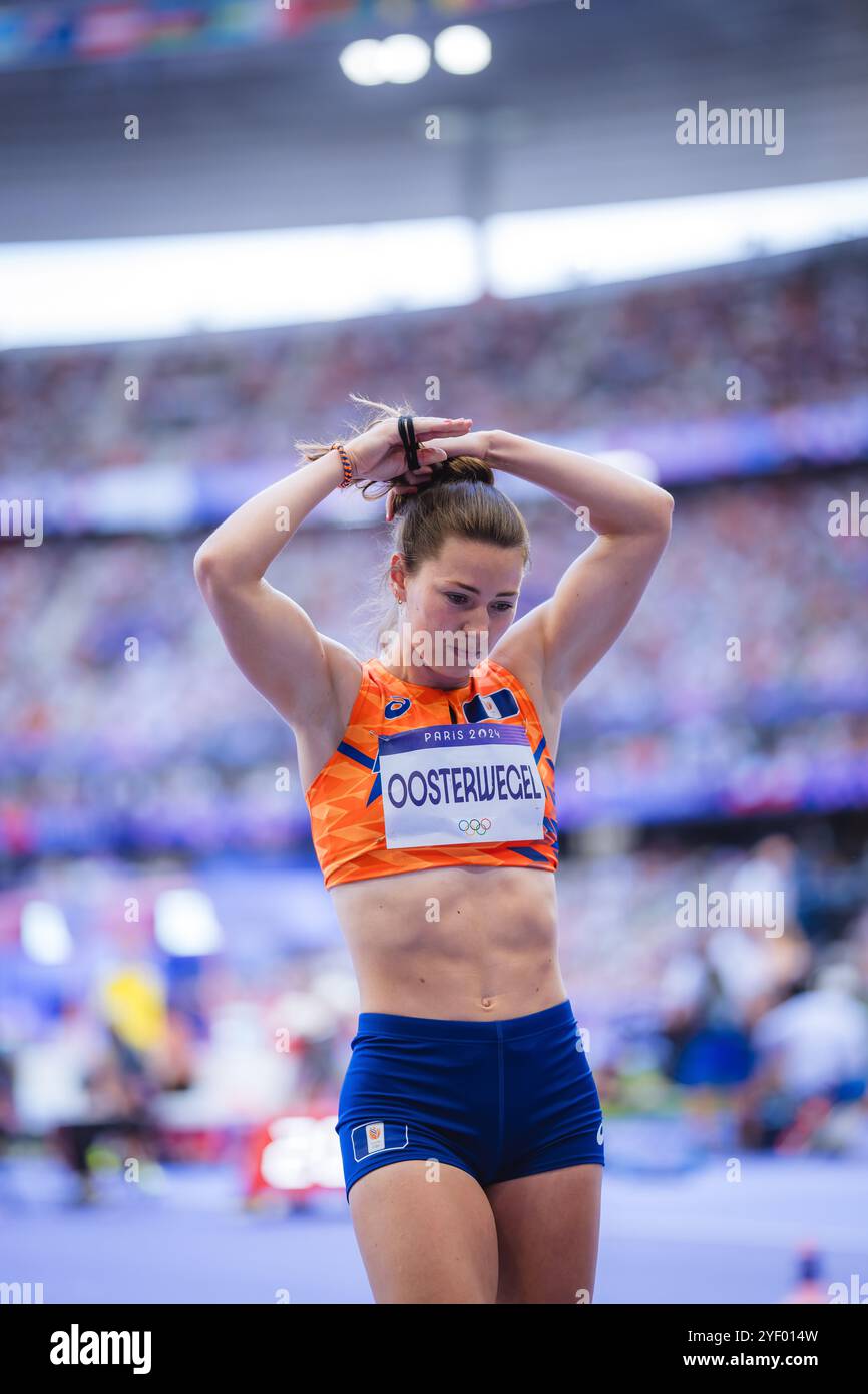 Emma Oosterwegel participating in the high jump at the Paris 2024 ...