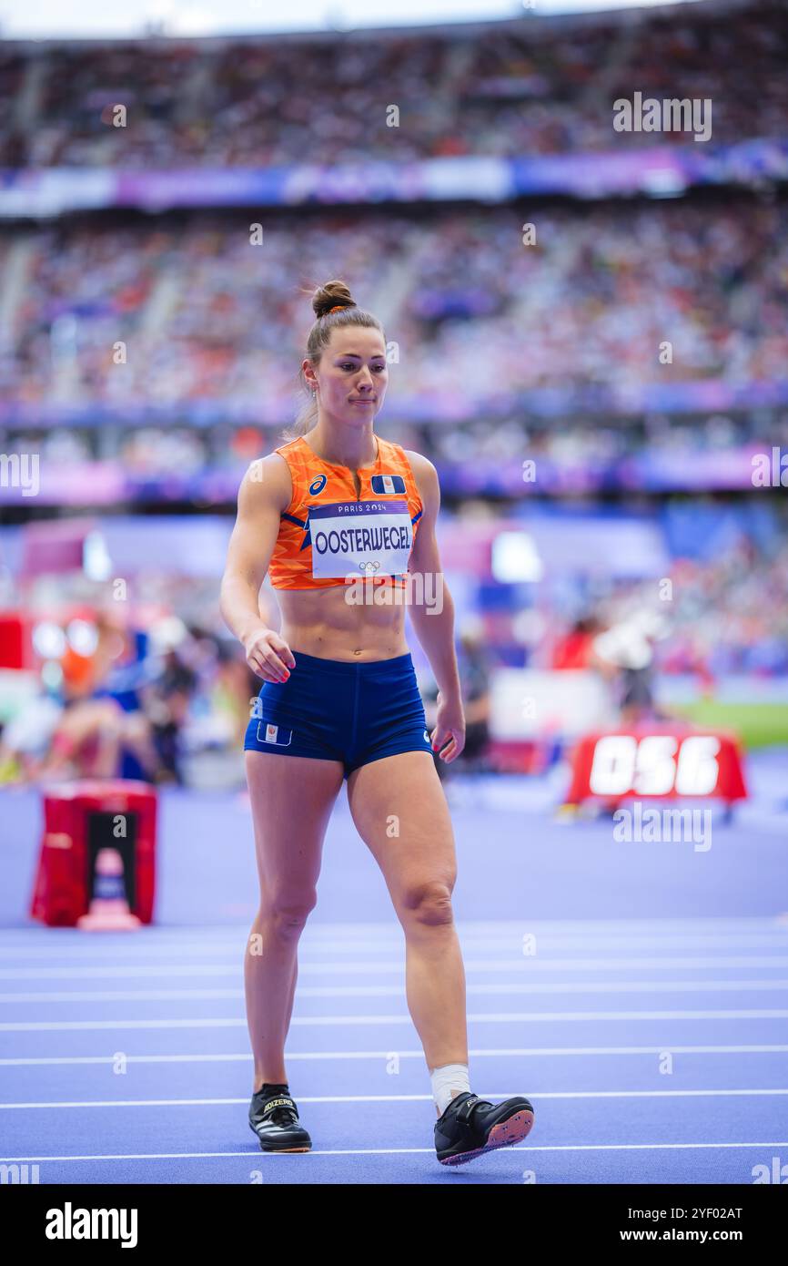 Emma Oosterwegel participating in the high jump at the Paris 2024 ...