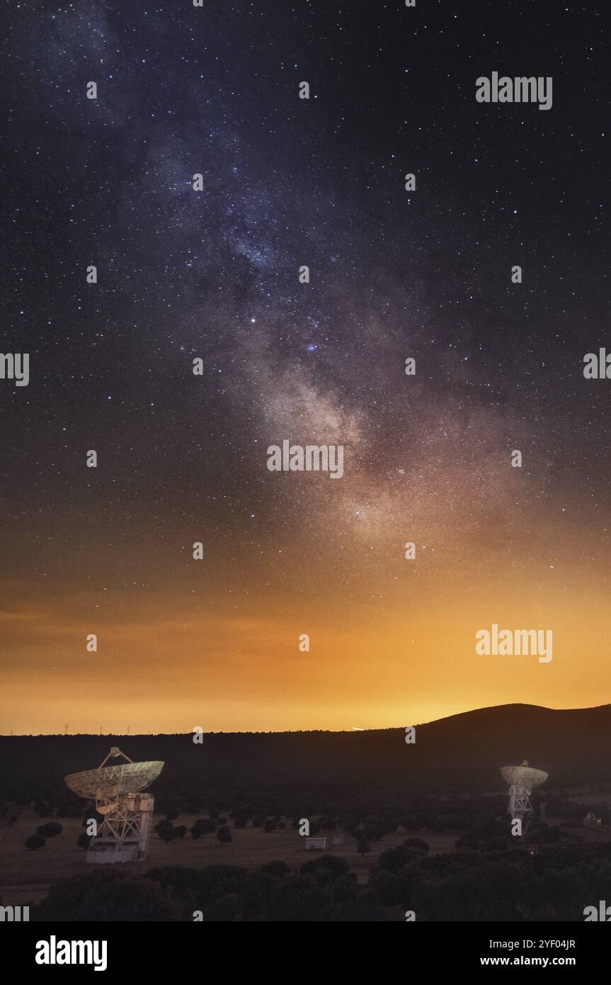 Group of radio telescopes and milky way Stock Photo - Alamy