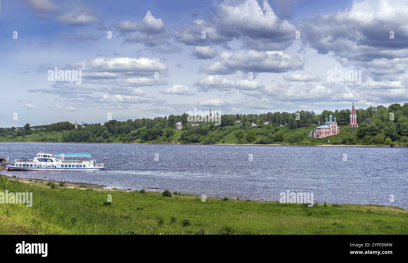 View of the banks of the Volga River with churches in Tutayev, Russia ...