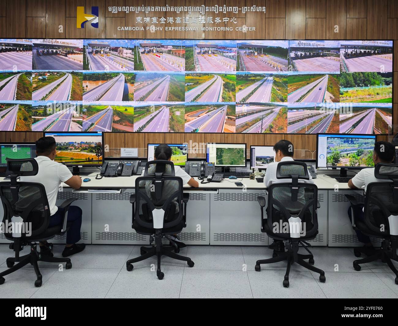 Phnom Penh, Cambodia. 1st Nov, 2024. Staff members work in a traffic camera control room of the ...