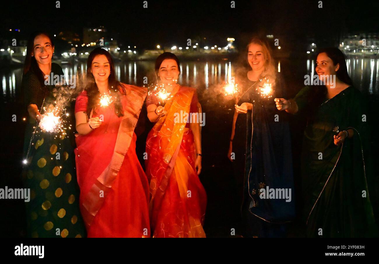 Ajmer, India. 01st Nov, 2024. Foreign tourists celebrate Diwali with ...