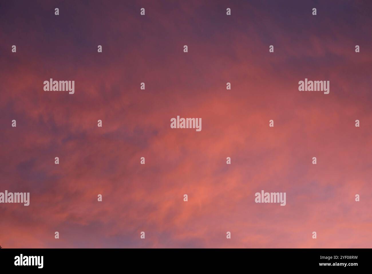 Sunset colours the sky red Stock Photo - Alamy