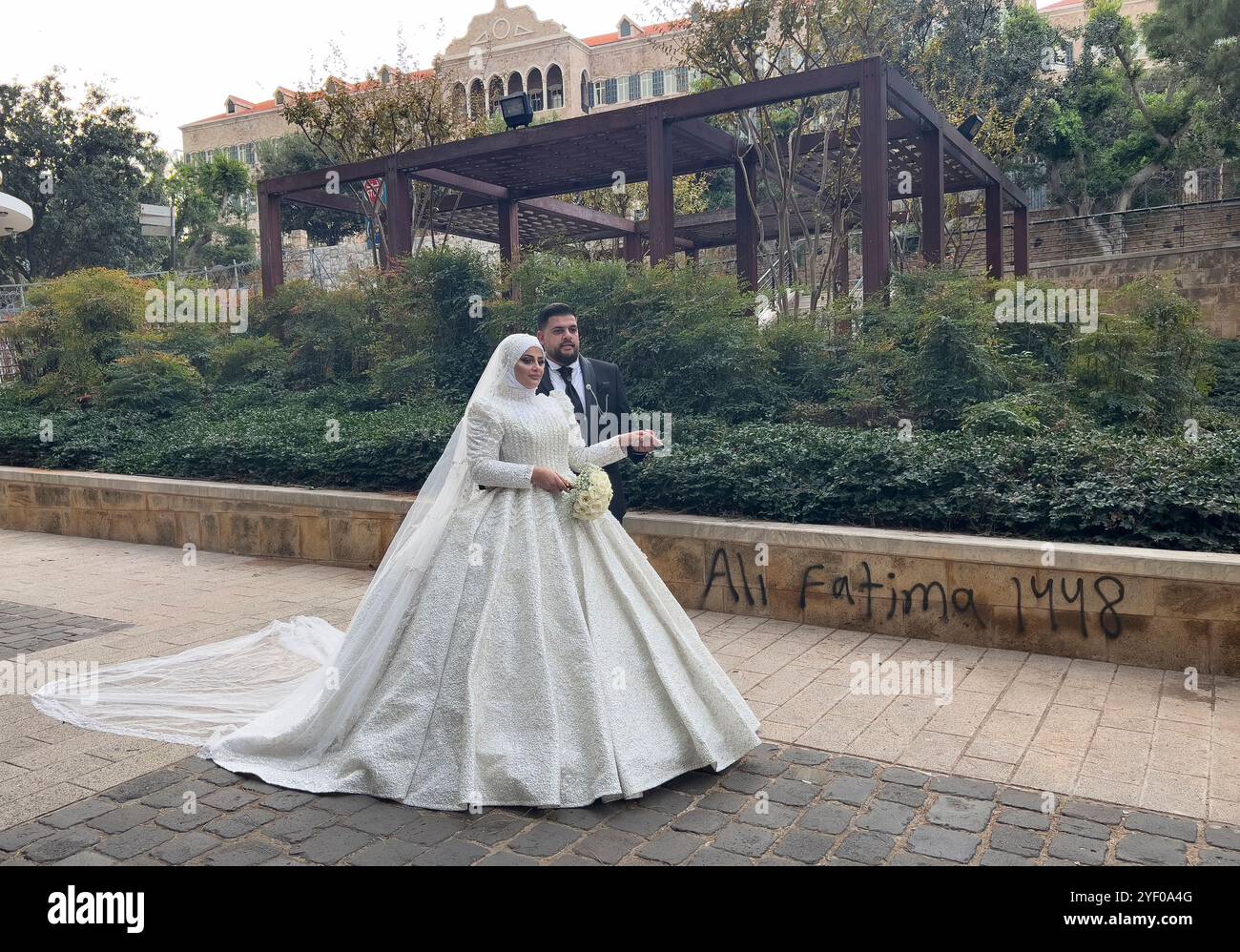 Palestinian groom Tarek Farra, 23, from Gaza and his wife Esraa Akila ...