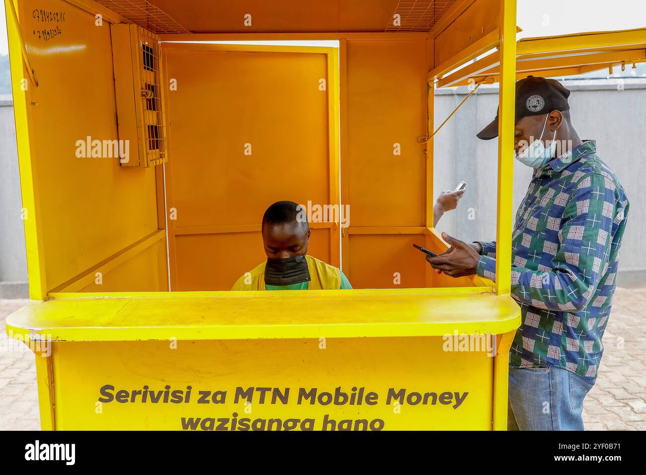 Mobile banking in Kigali, Rwanda Stock Photo - Alamy