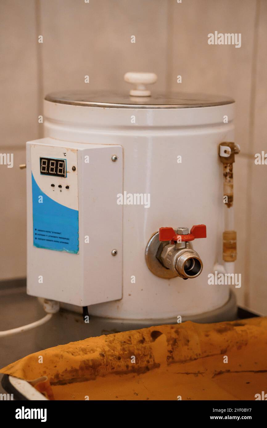 Industrial Water Heater with Digital Display in a Kitchen Environment ...