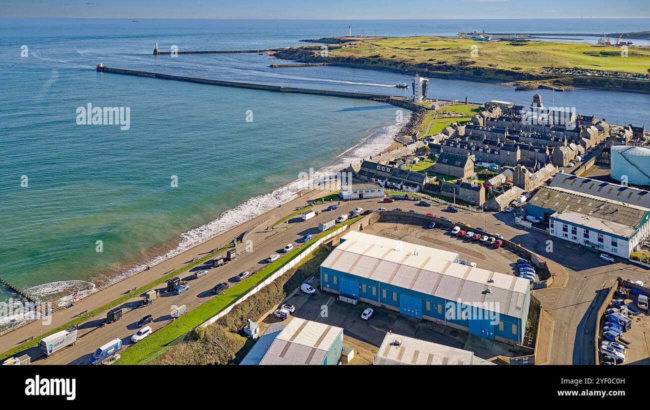 Aberdeen Scotland view across sea sand beach the houses of Footdee to ...