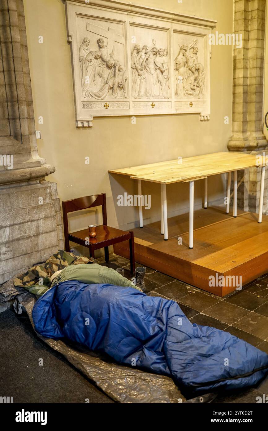Homeless person sleeping in Our Lady of Assistance catholic church ...