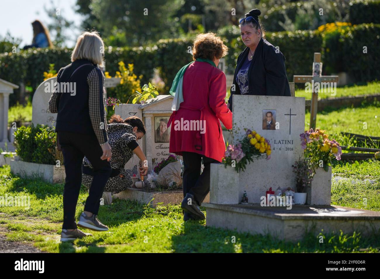 People visit the graves of their dearly departed on the occasion of the ...