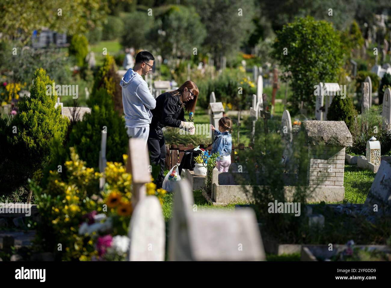 People visit the graves of their dearly departed on the occasion of the ...