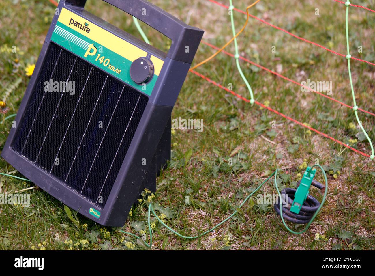 Electric fence powered by a solar panel. Les Contamines. France Stock ...