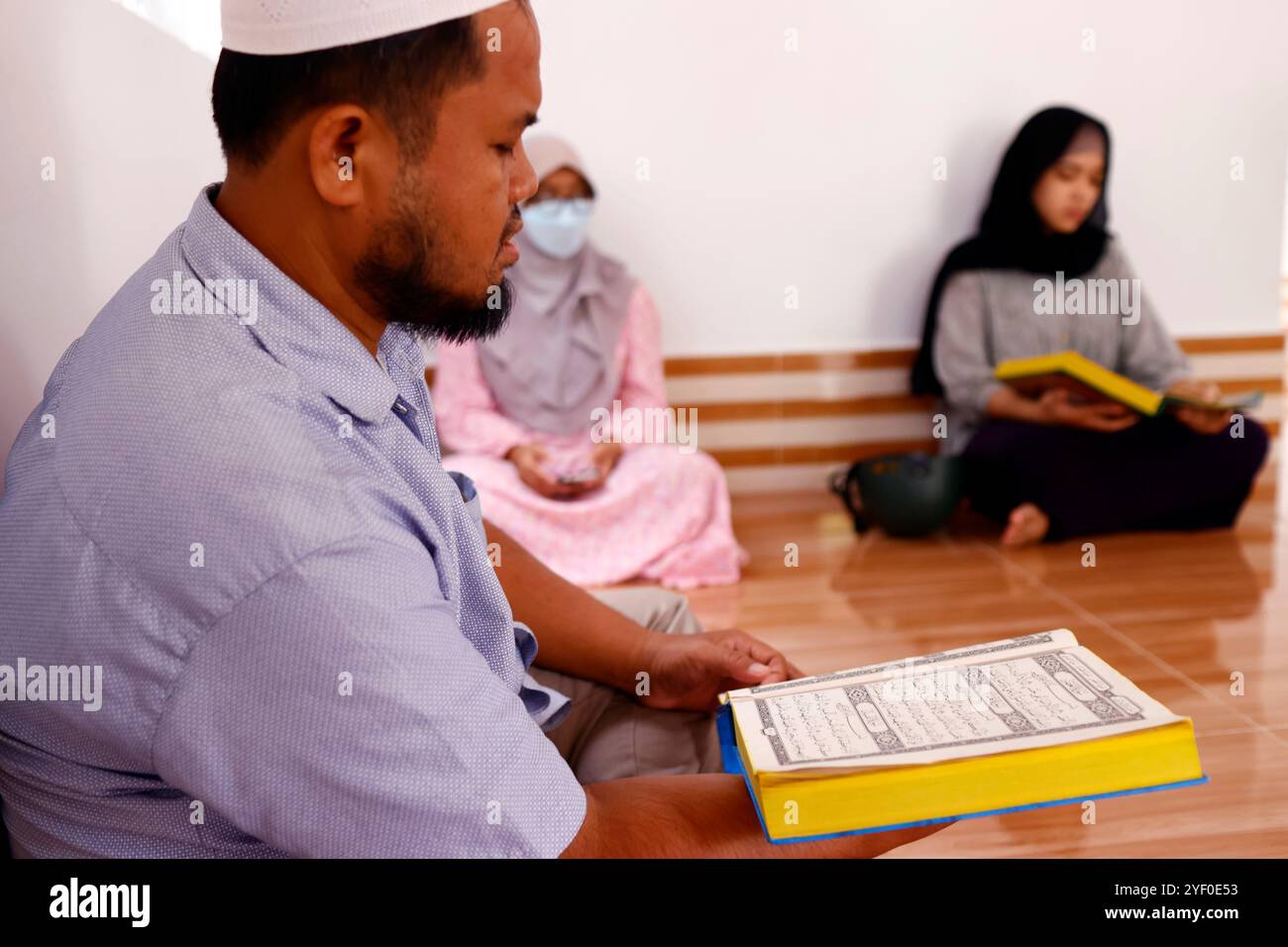 Islamic school. Students studying he Holy Quran. Vietnam Stock Photo ...