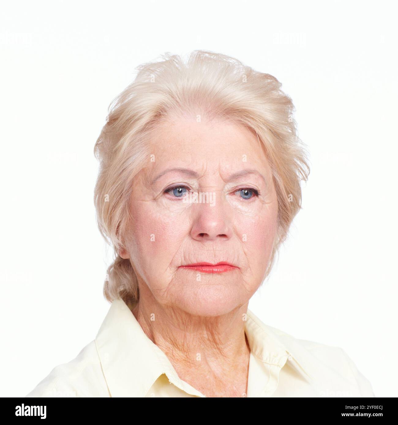 Studio, senior woman and serious with thinking for nostalgic memory, remember and mental health ...