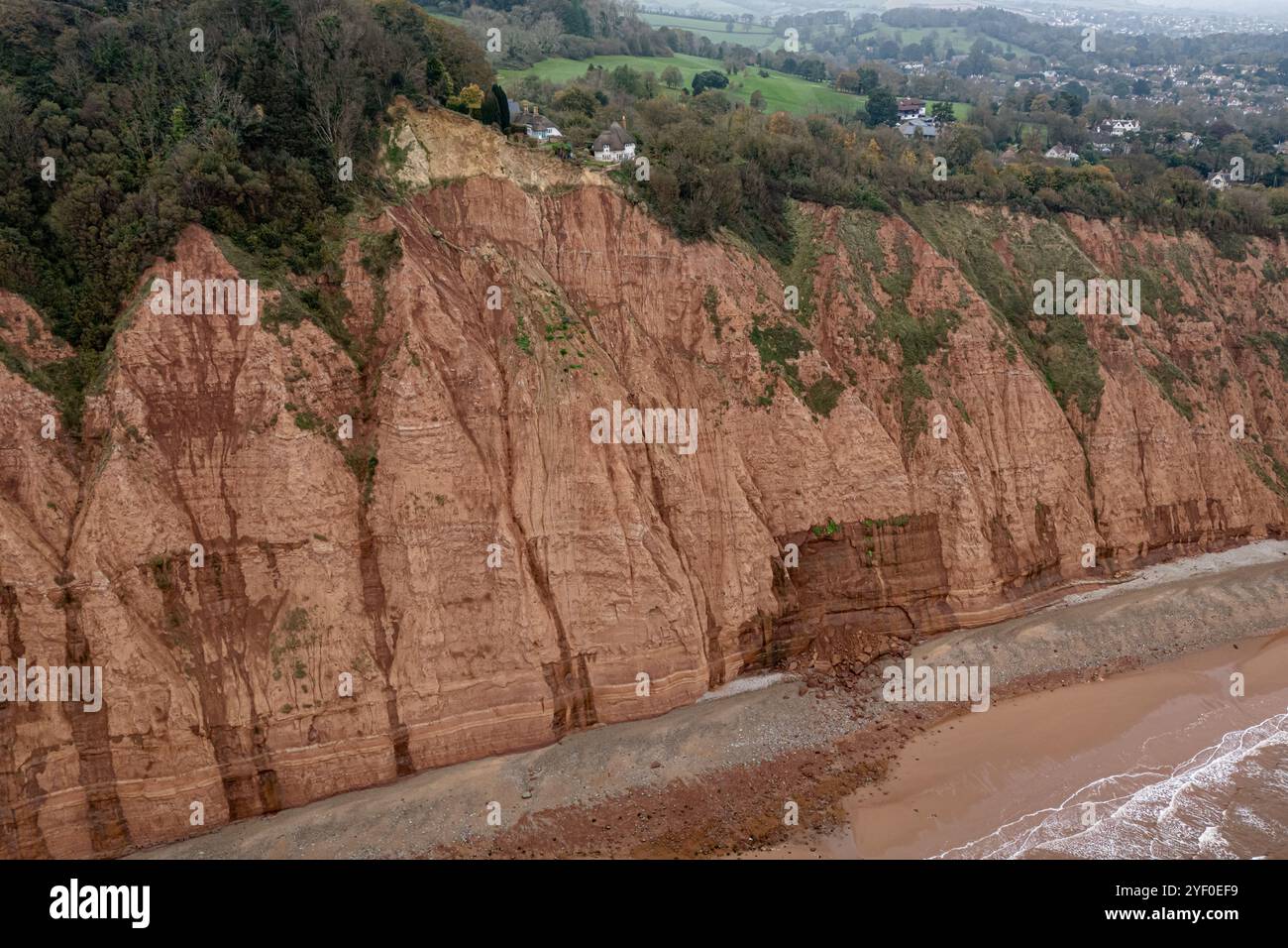 A cottage, sitting 10-metres from a cliff edge with a 400ft drop ...